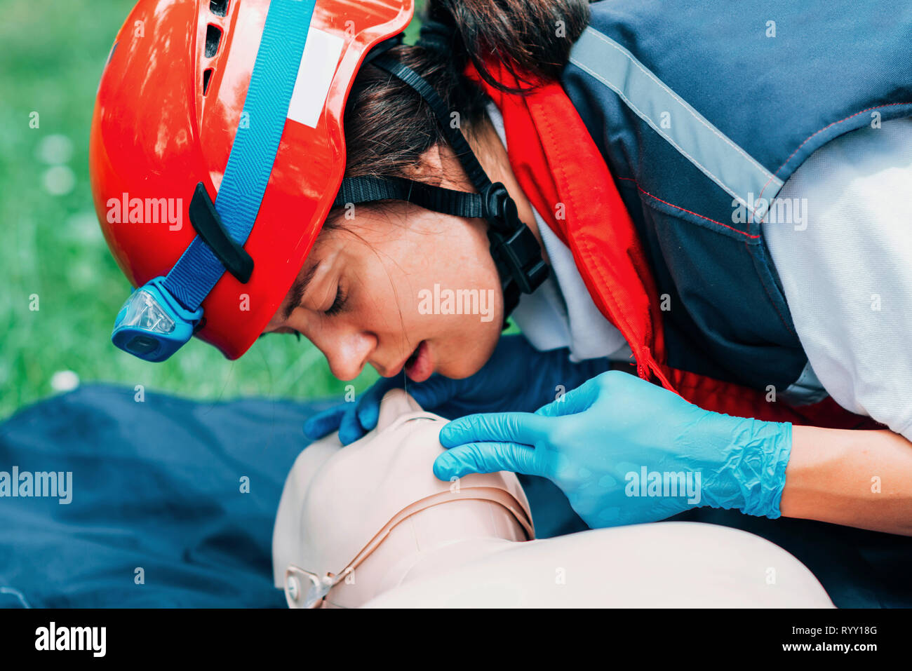CPR training outdoors Stock Photo - Alamy