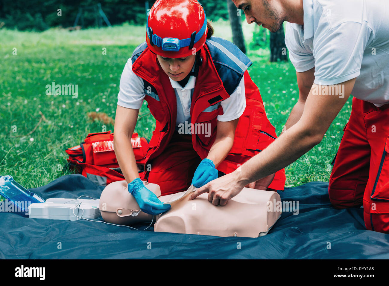 CPR training on dummy outdoors Stock Photo - Alamy