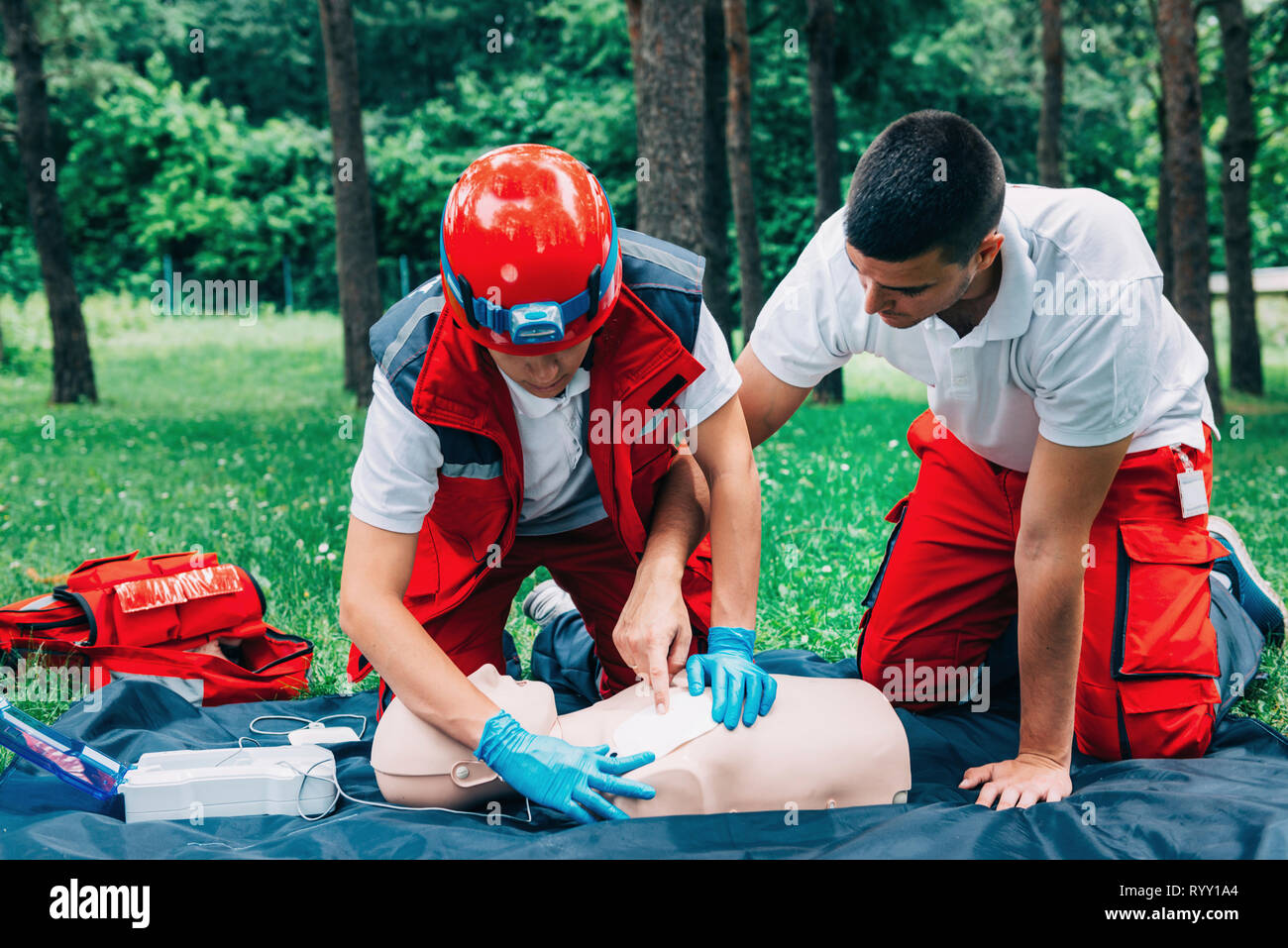 CPR training on dummy outdoors Stock Photo - Alamy