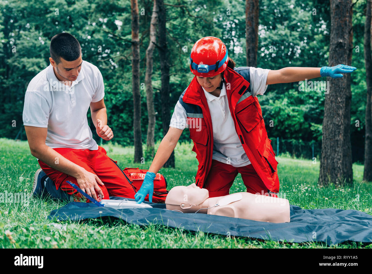 CPR training on dummy outdoors Stock Photo - Alamy