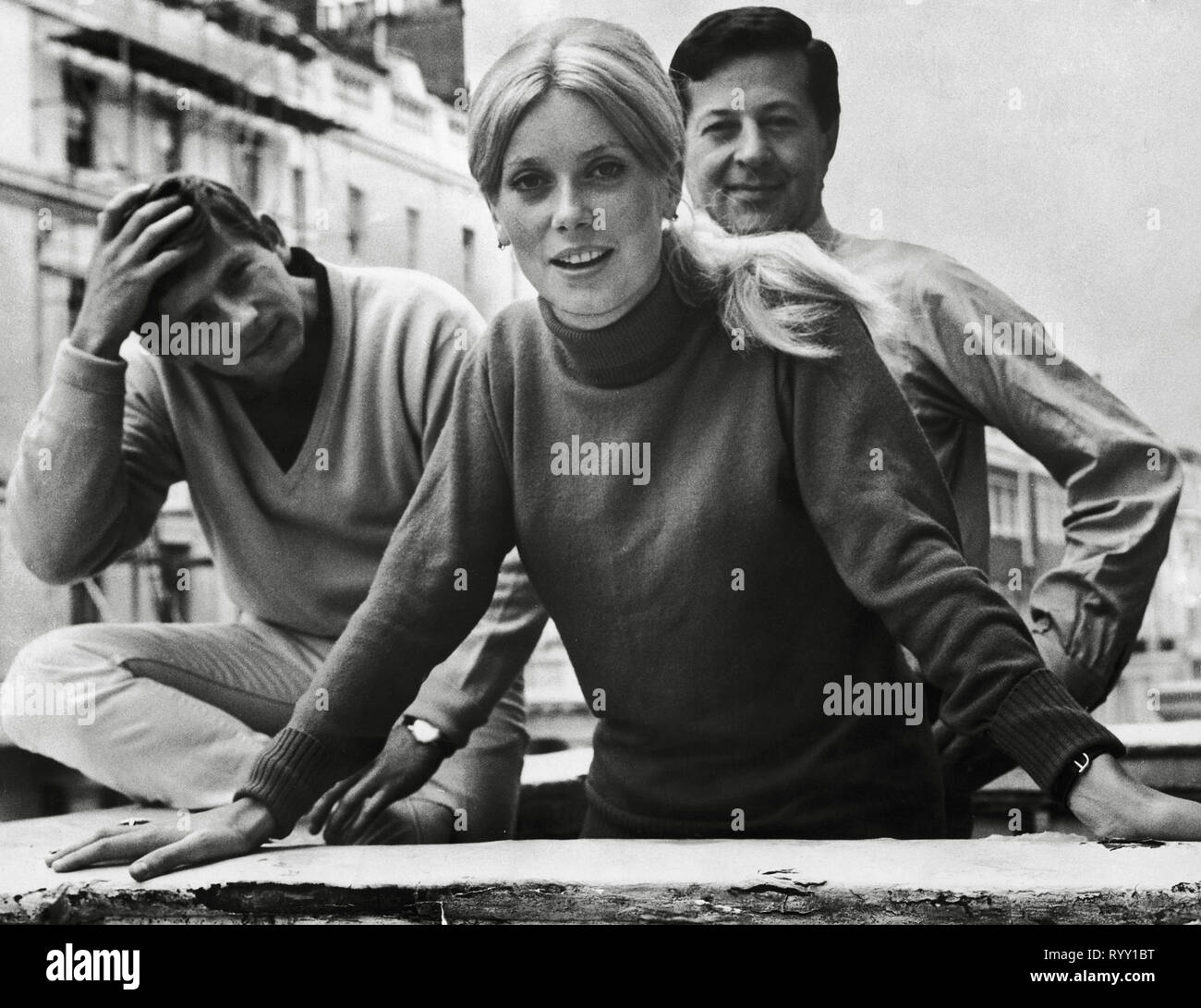 Catherine Deneuve, with director Roman Polanski (left) and producer ...