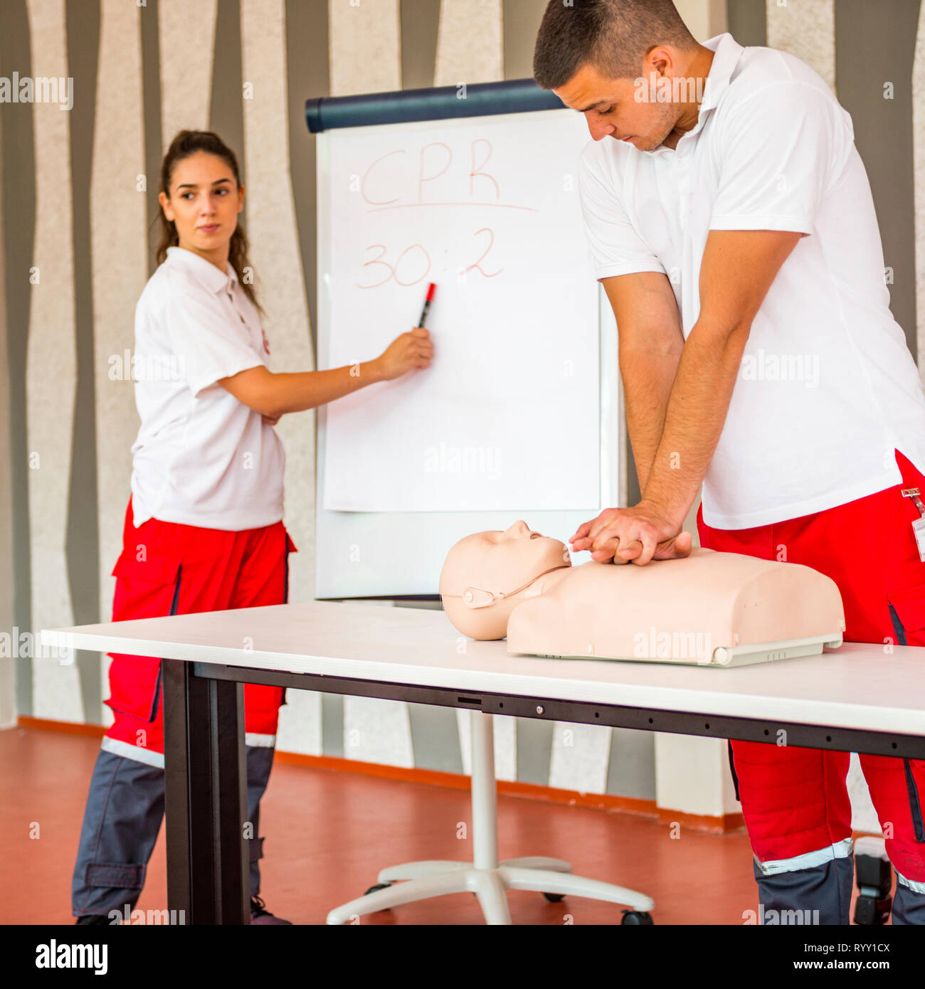 Chest compressions woman hi-res stock photography and images - Alamy