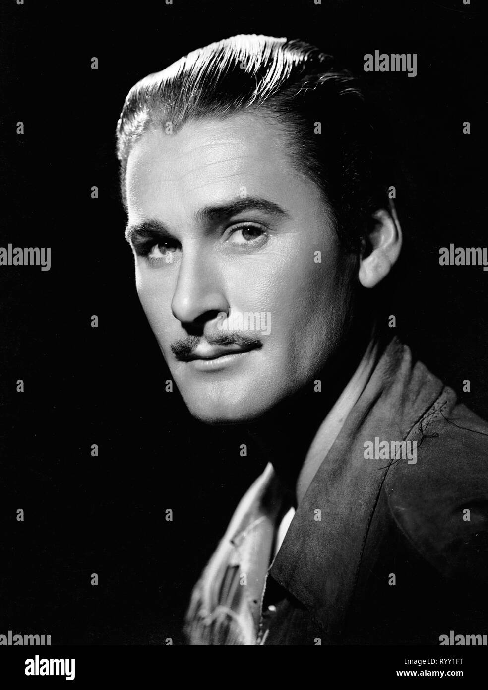 Errol Flynn, circa (1938) File Reference # 33751 902THA Stock Photo - Alamy