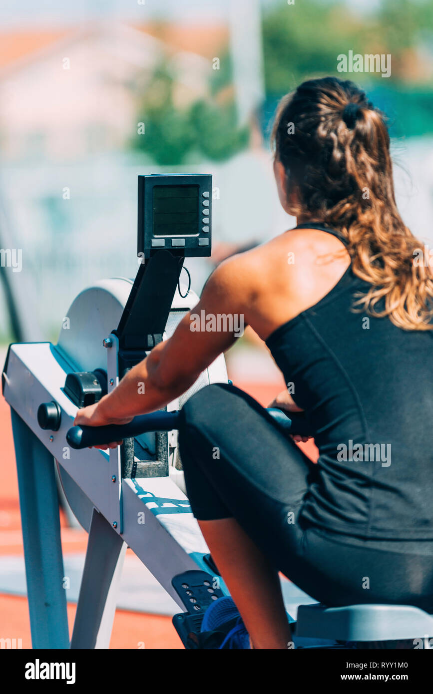 Girl rowing machine hi-res stock photography and images - Alamy