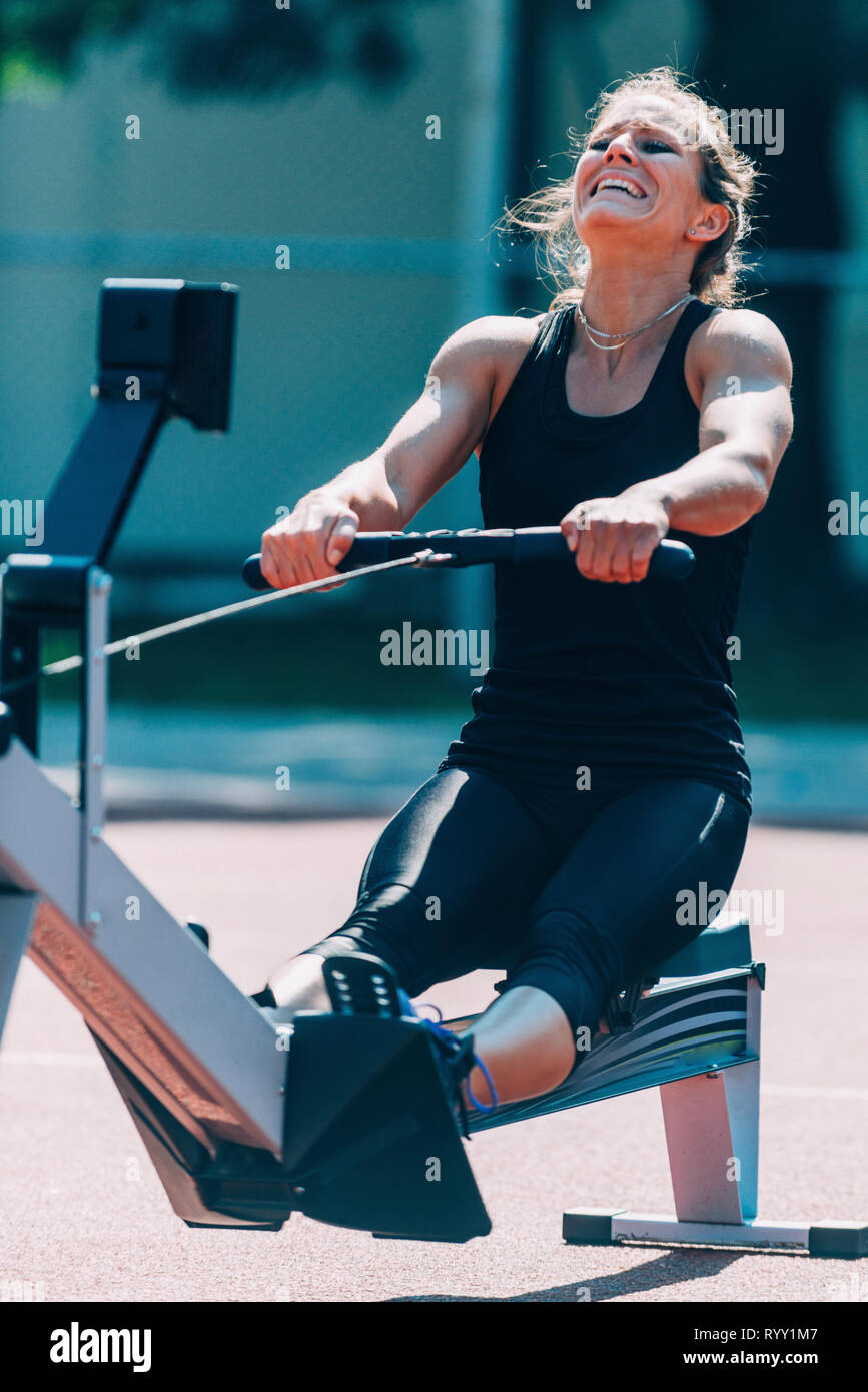 Girl rowing machine hi-res stock photography and images - Alamy
