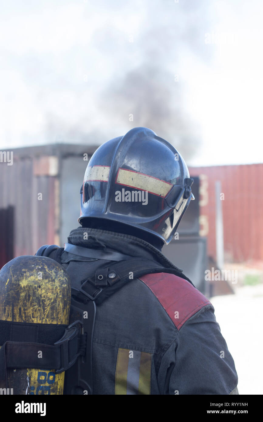 Firefighter putting out fire training station extinguisher backdraft ...