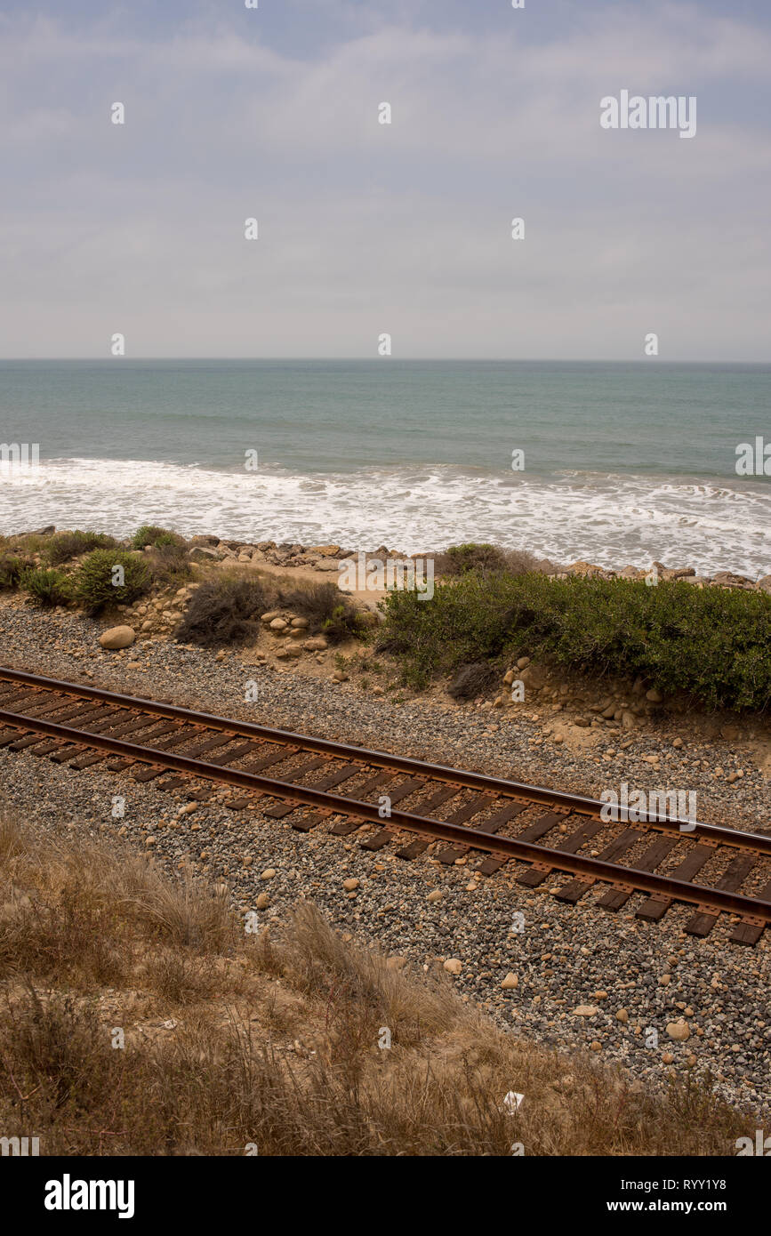 Railroad Tracks parallel the Pacific Ocean on a California Coastal ...