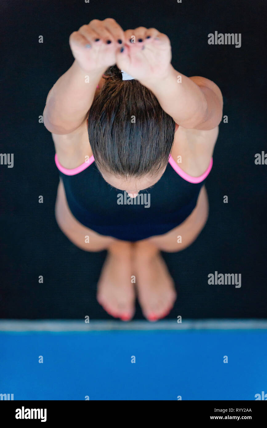 Female diver on platform Stock Photo - Alamy