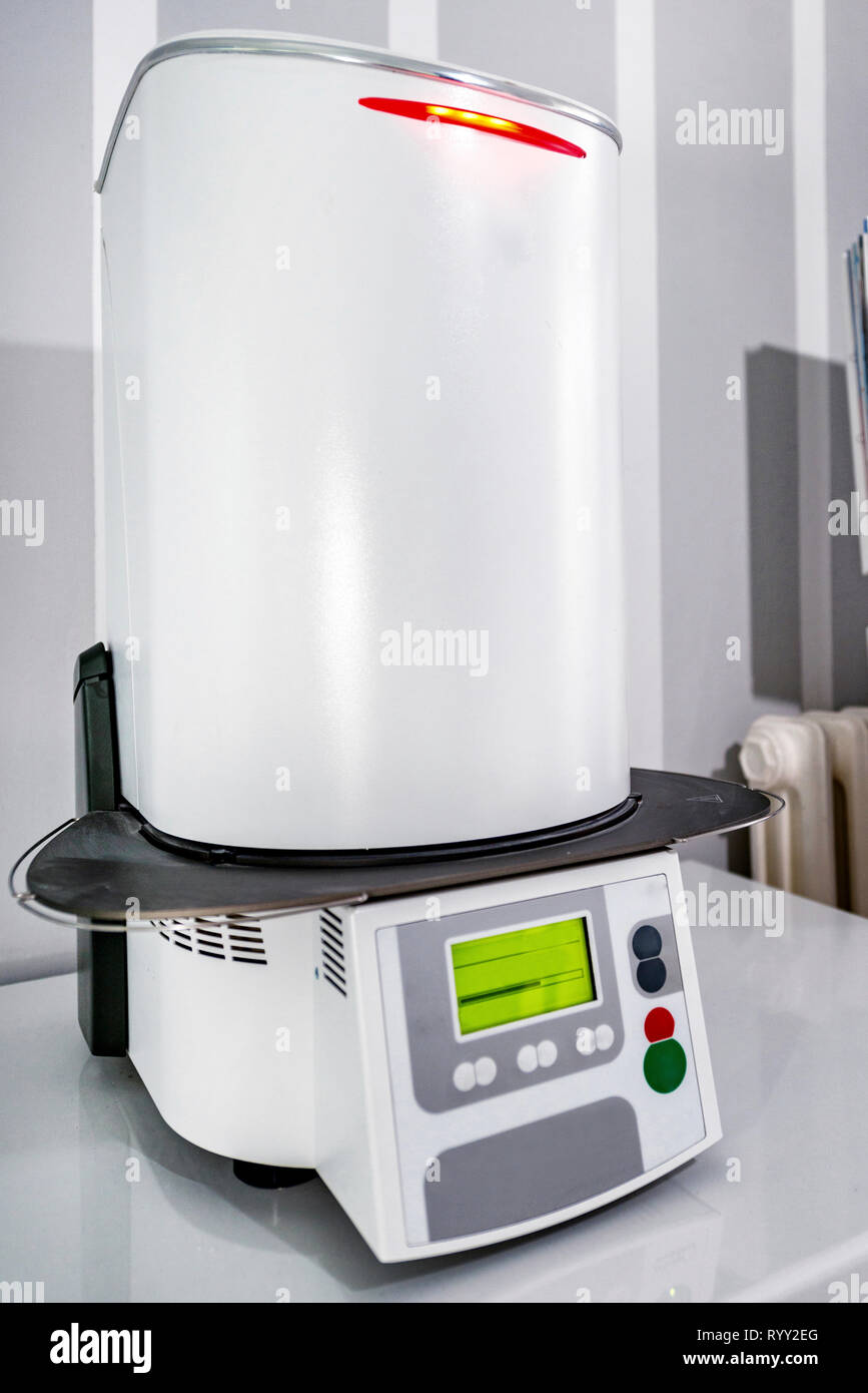 Dental press oven Stock Photo - Alamy