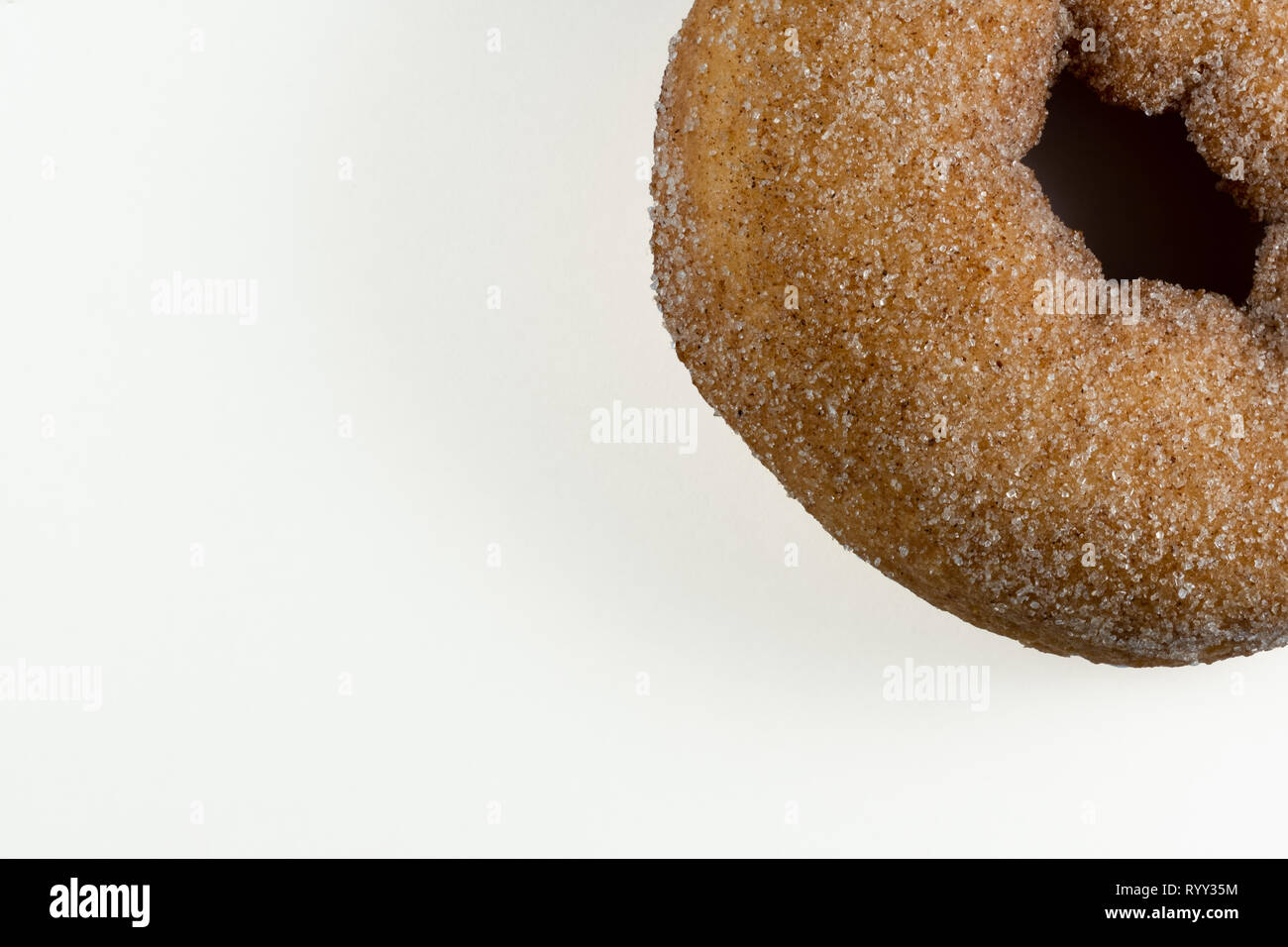Doughnut closeup with white background Stock Photo - Alamy