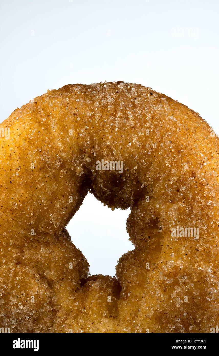 Doughnut closeup in portrait on white background Stock Photo - Alamy