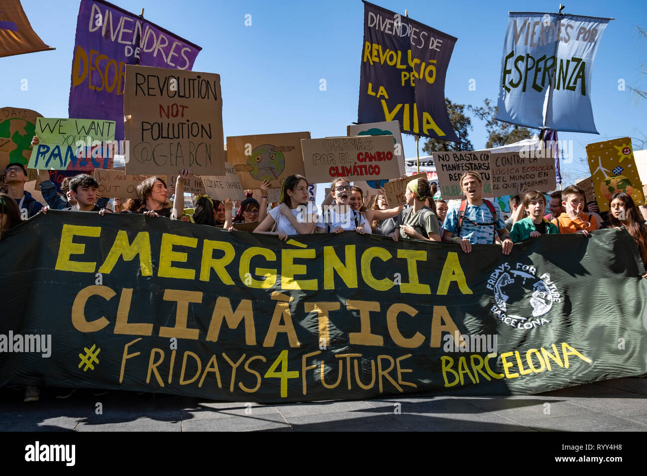 Protesters are seen holding a banner with the theme Climate emergency ...