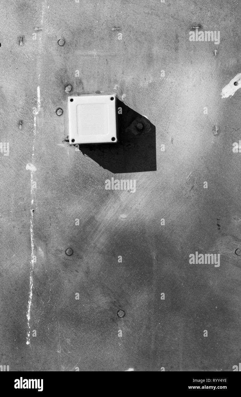 plastic electrical casing on metal plate Stock Photo - Alamy