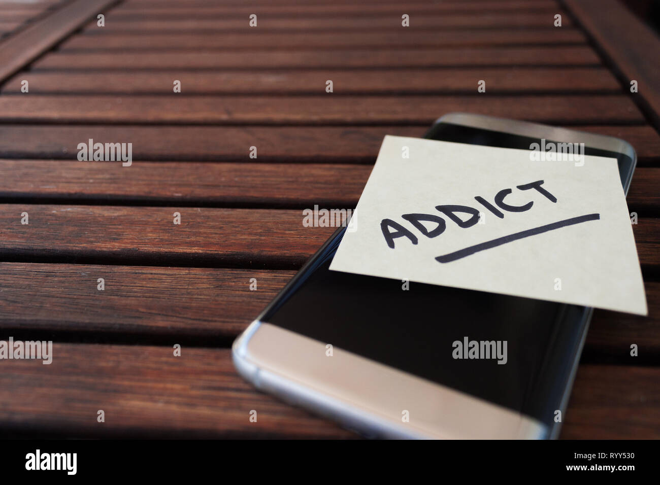 Mobile phone with sticky note as reminder to take a break Stock Photo ...