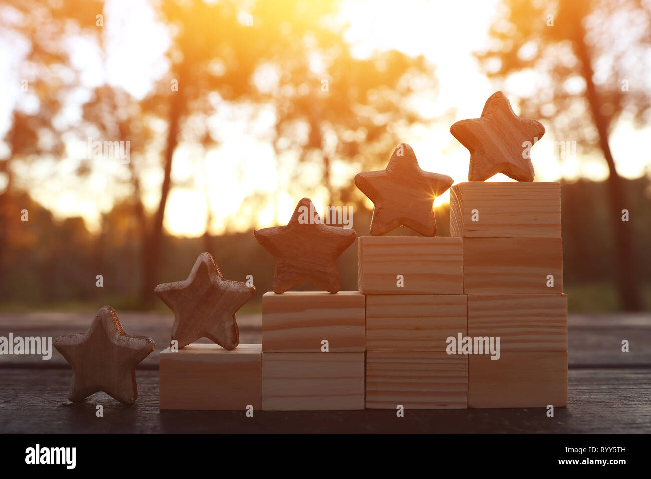 concept image of setting a five star goal. increase rating or ranking ...