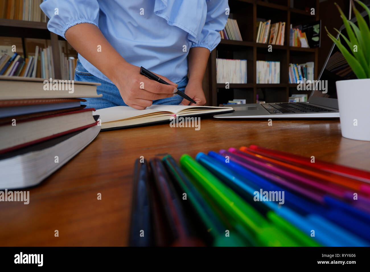 Teenager reading novel classroom hi-res stock photography and images ...