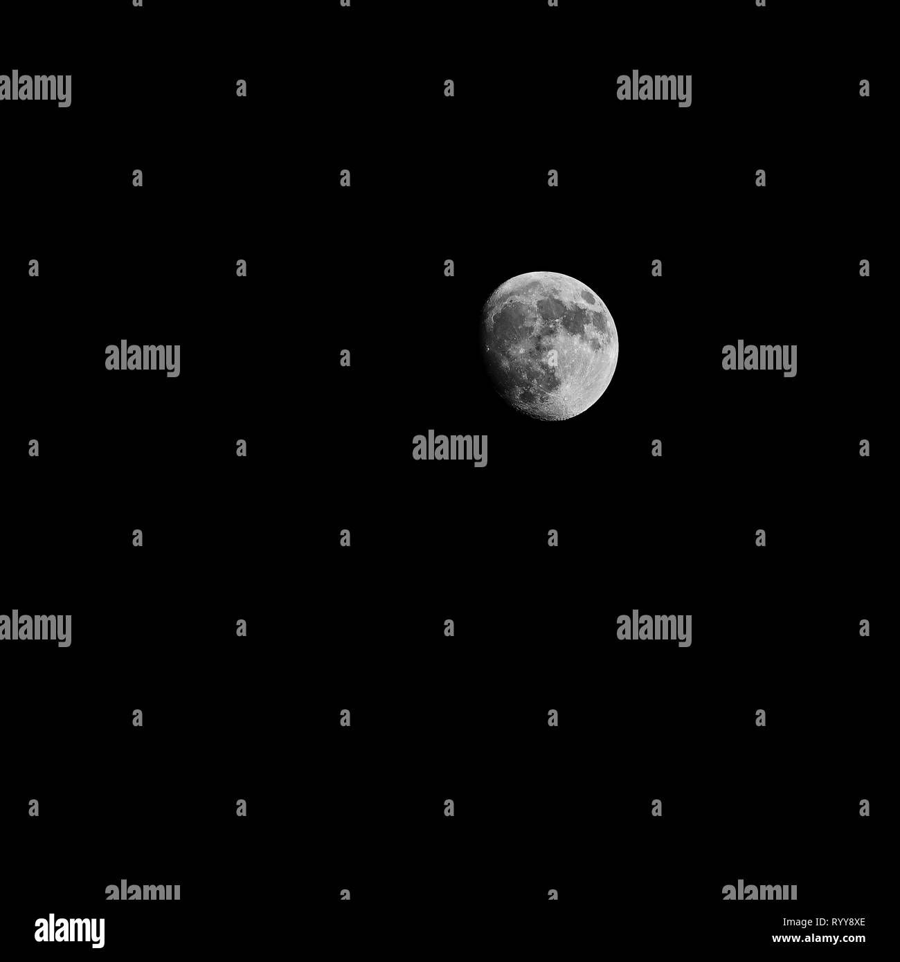 Full moon over dark black sky at night Stock Photo - Alamy