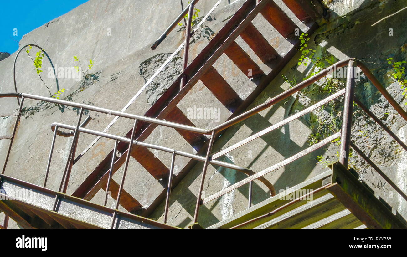 The stairs going up to the top of the ruins it is a metal stair used by ...