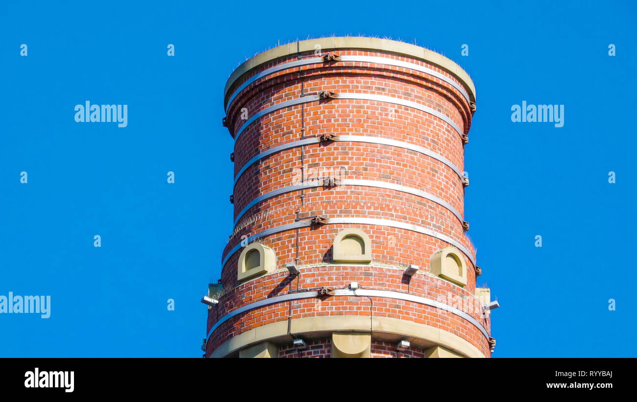 A dome tower with brick walls and a small window on it Stock Photo - Alamy