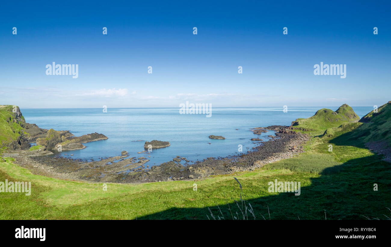 The landscape view of the Giants Causeway with the basalt rocks and the ...
