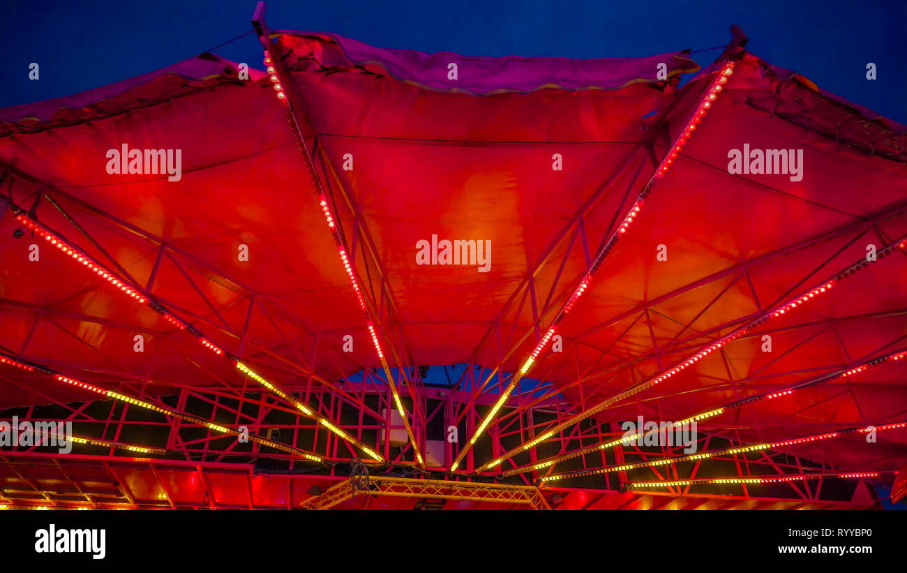 Colorful lights from the amusement park at night where kids even adults ...