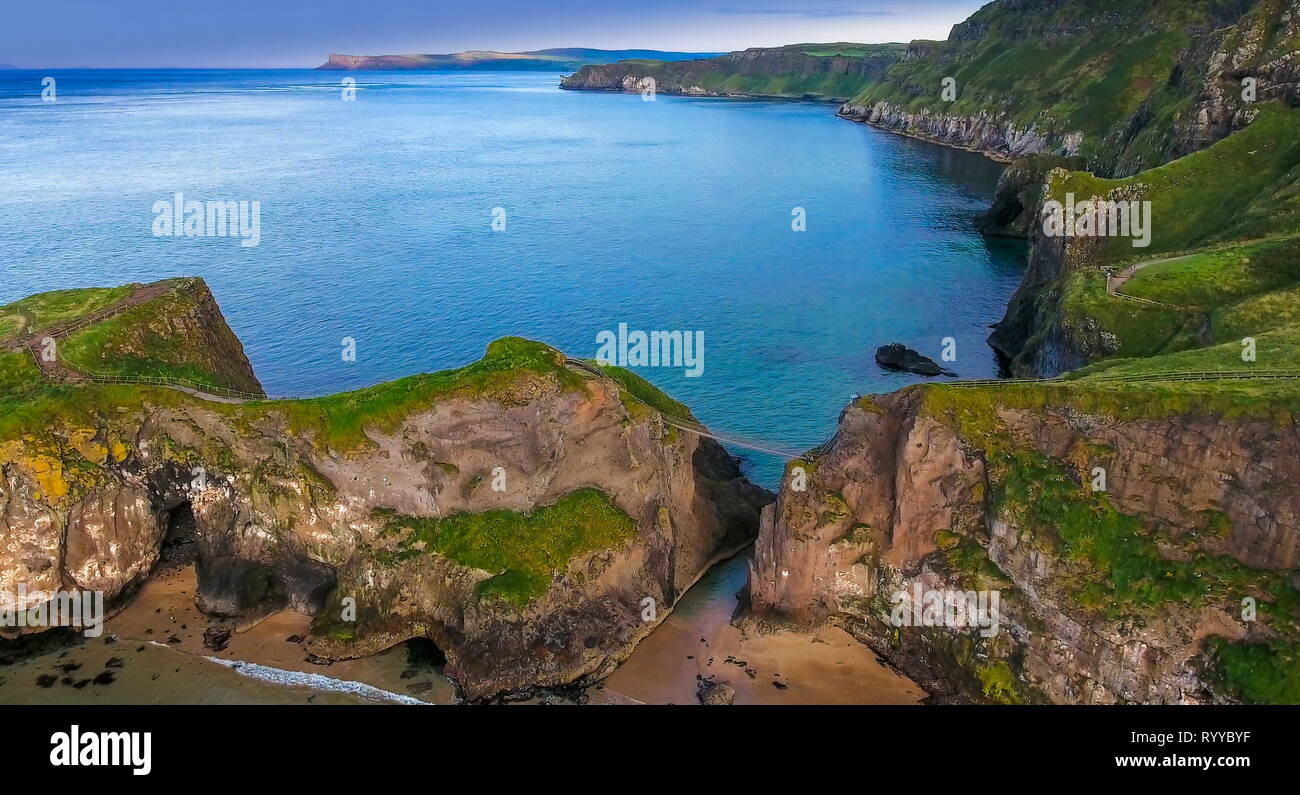 Aerial shot of the cliff in Carrick-a-Rede Rope Bridge in Northern ...
