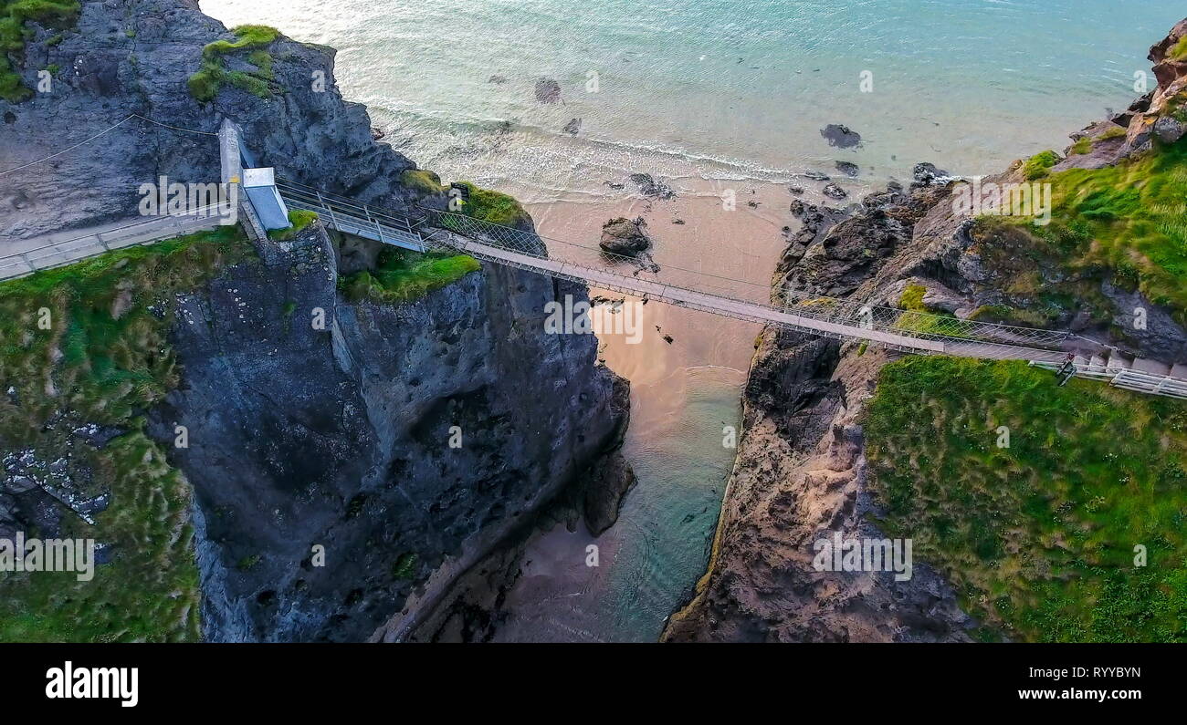 Aerial shot of the long rope bridge in Carrick-a-Rede. The bridge links ...