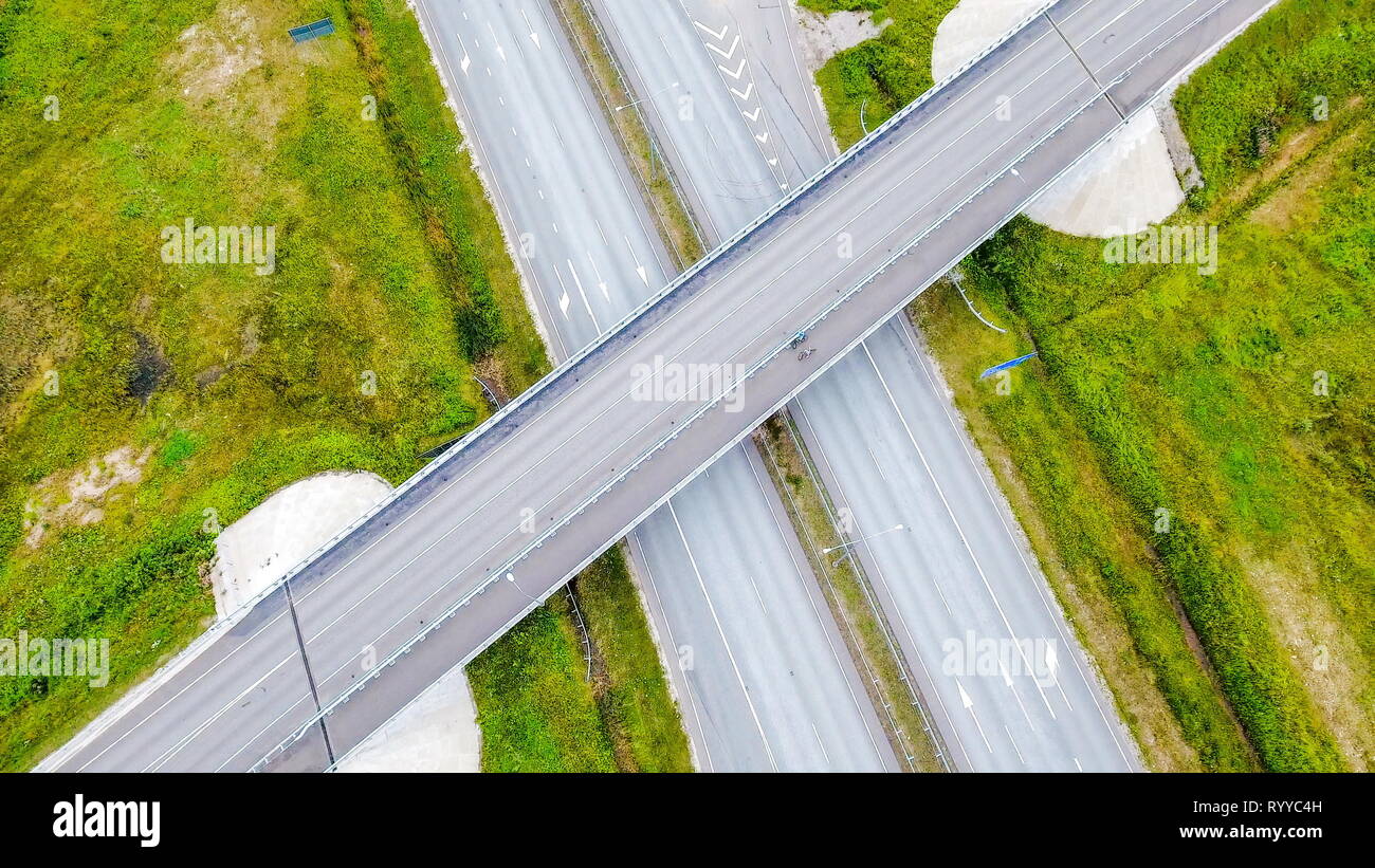 Aerial view of the big skyway road in the city the big road with cars ...