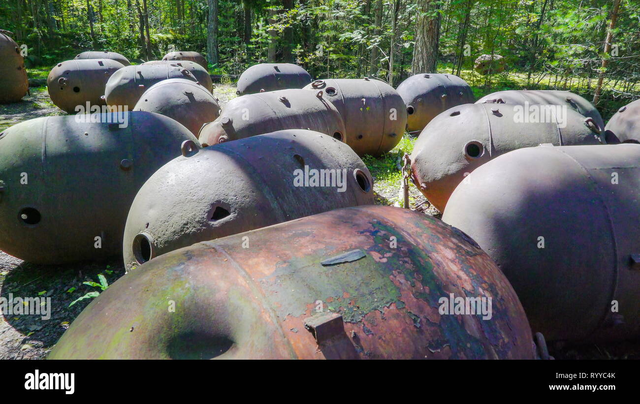 Bunch of vintage mines in the forest the mines from the war of the old ...