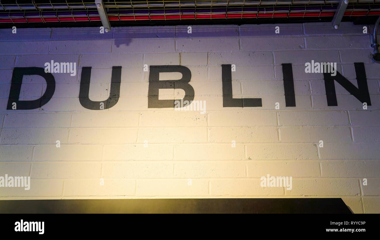 The front view of the signange Dublin outside the wall of the building ...