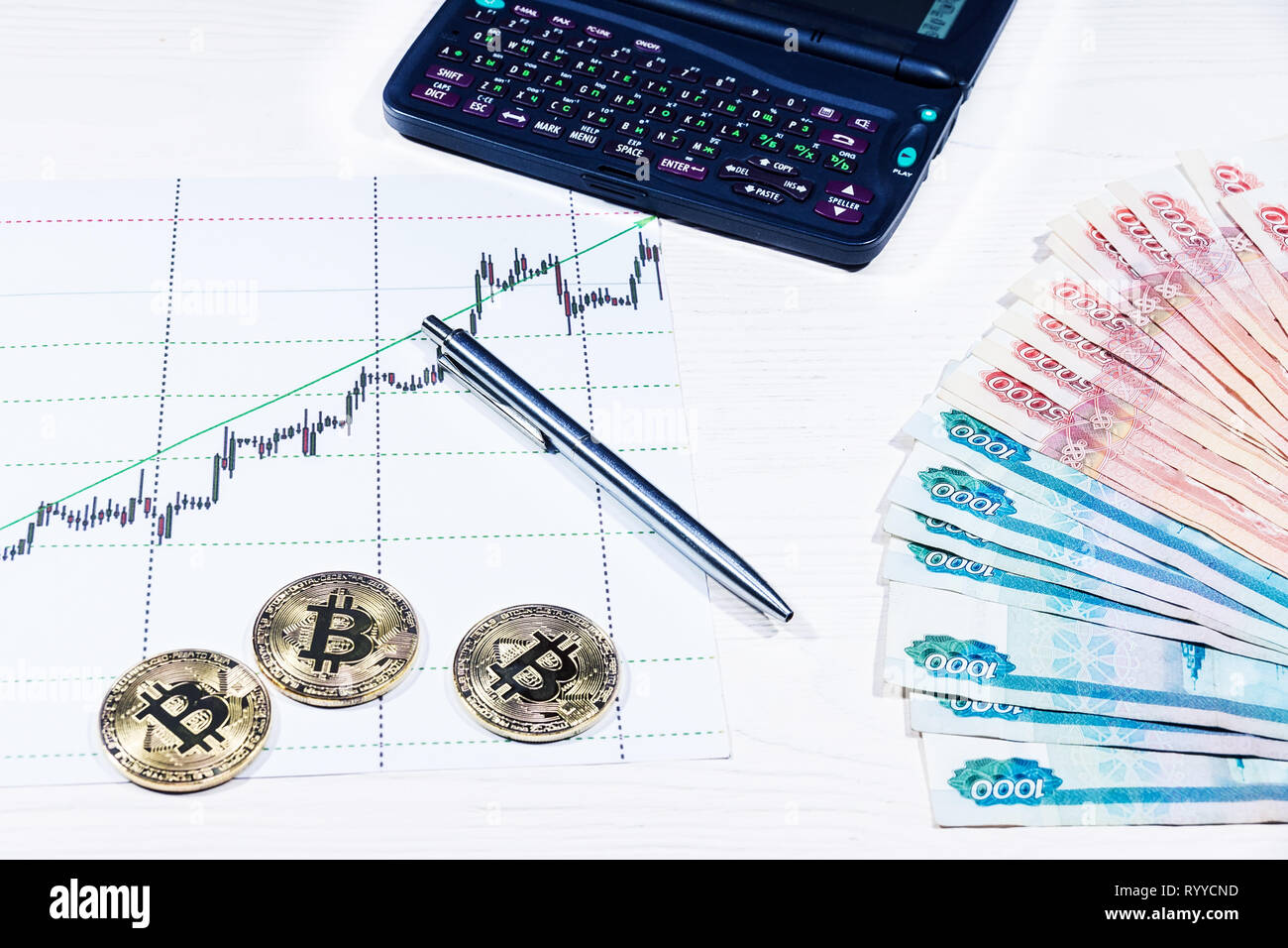 Bitcoin on the chart with money, finance Stock Photo - Alamy