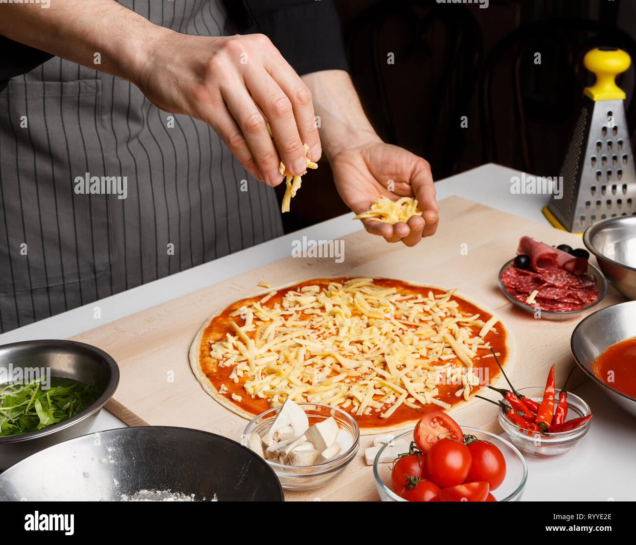 Sprinkling Cheese High Resolution Stock Photography and Images - Alamy