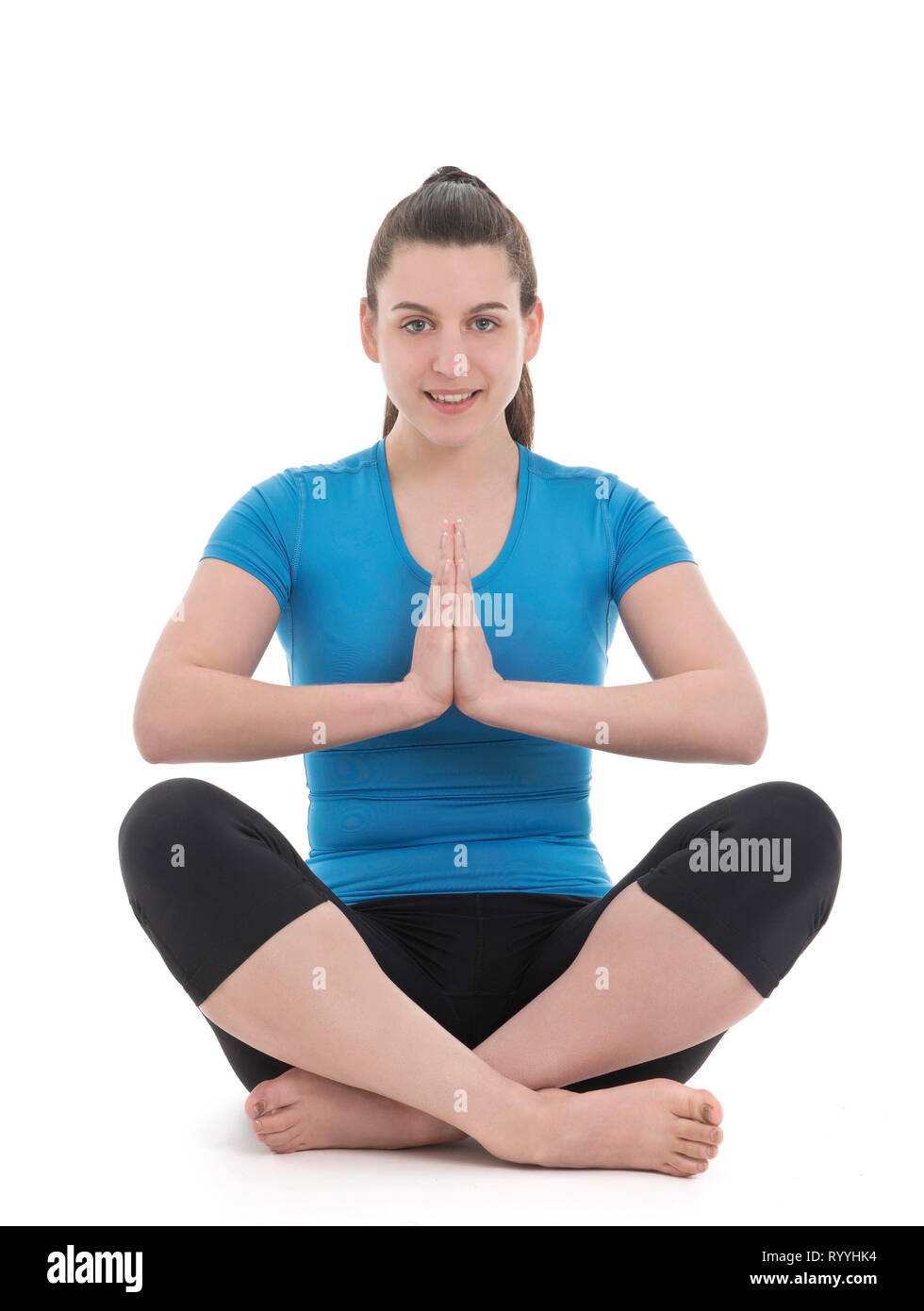 Fitness images. Girl exercising in a yoga pose on white background ...