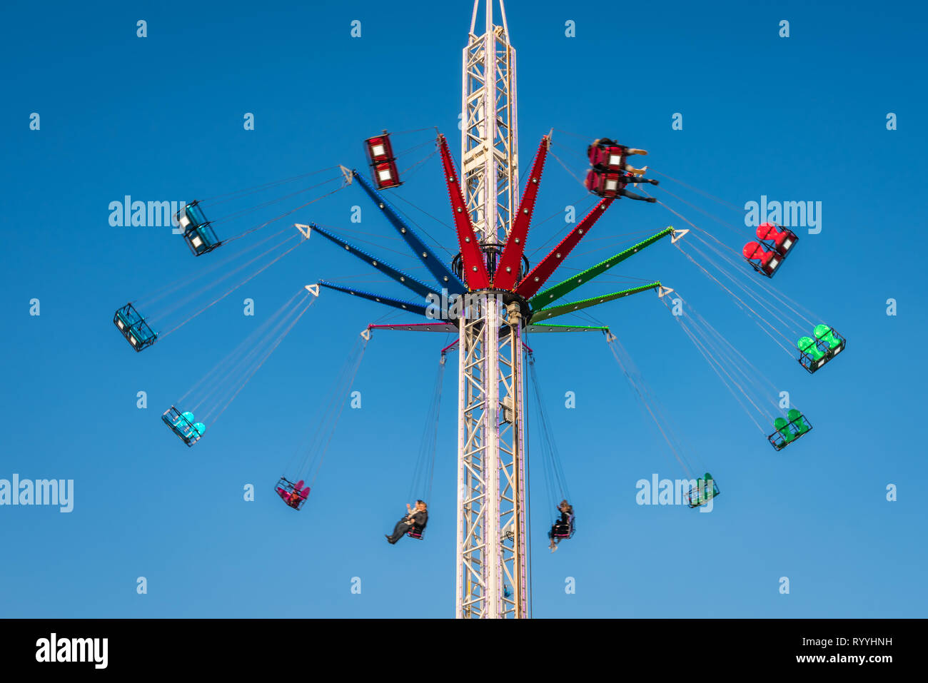 London, England - November 2018 : Fast high carousel ride on an outdoor ...