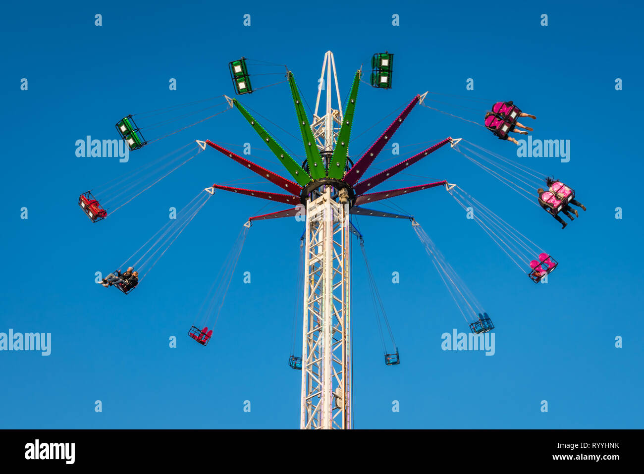 London, England - November 2018 : Fast high carousel ride on an outdoor ...