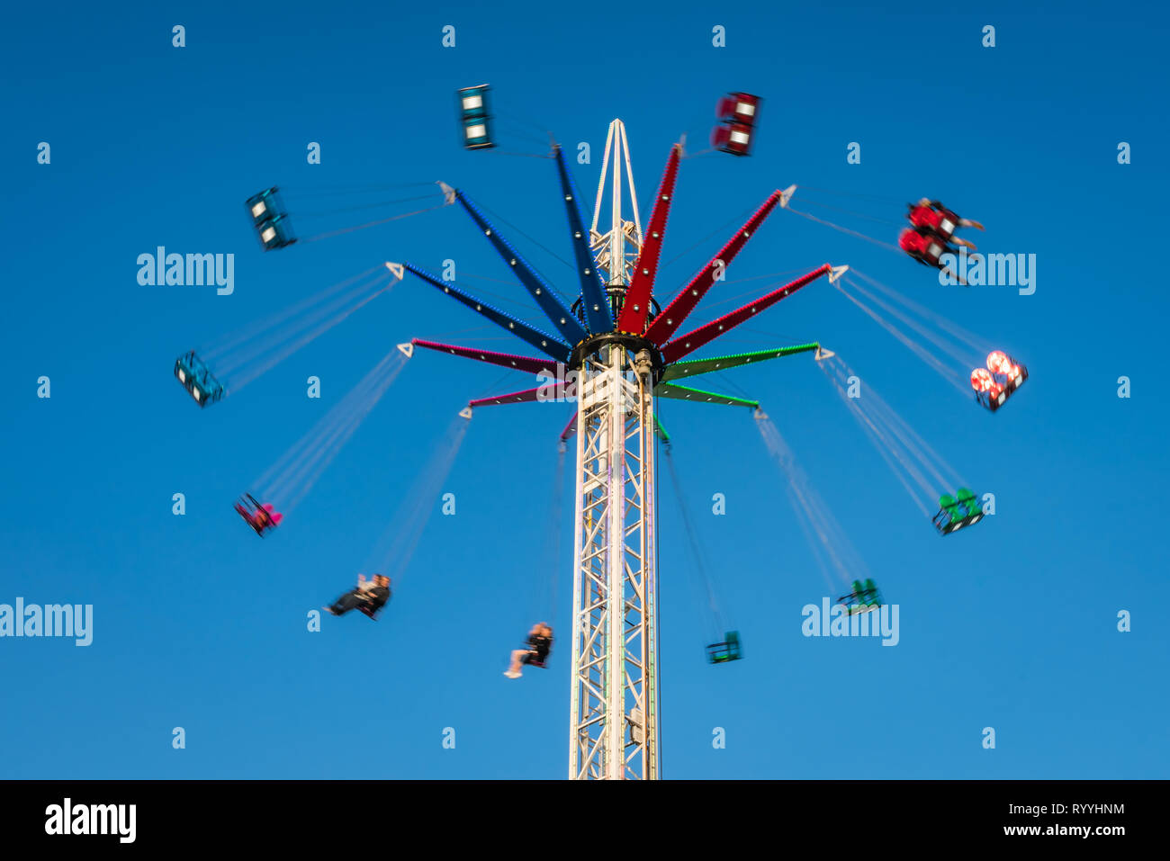 London, England - November 2018 : Fast high carousel ride on an outdoor ...
