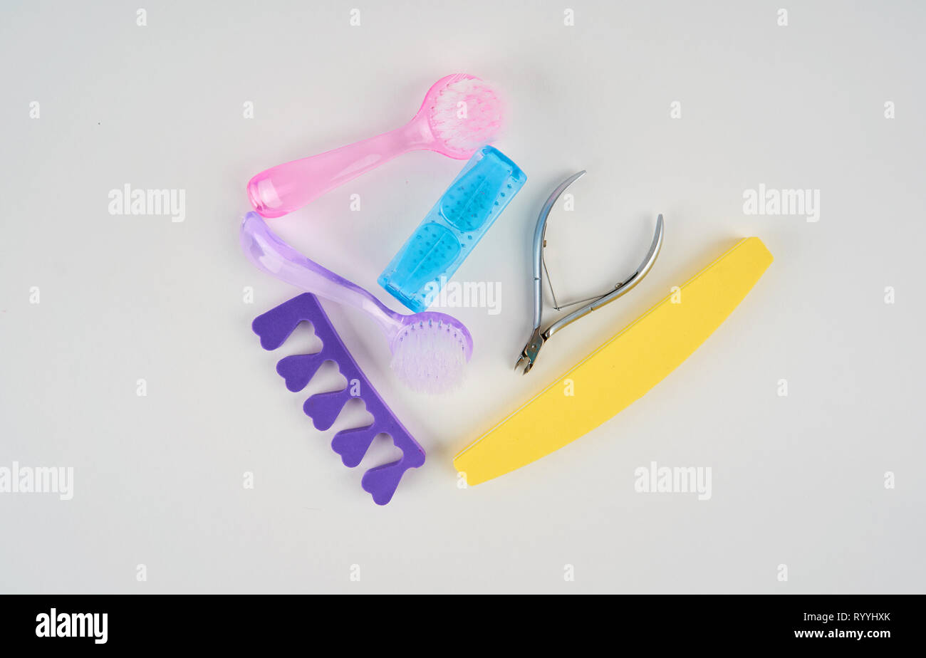 manicure tools on a white background Stock Photo - Alamy