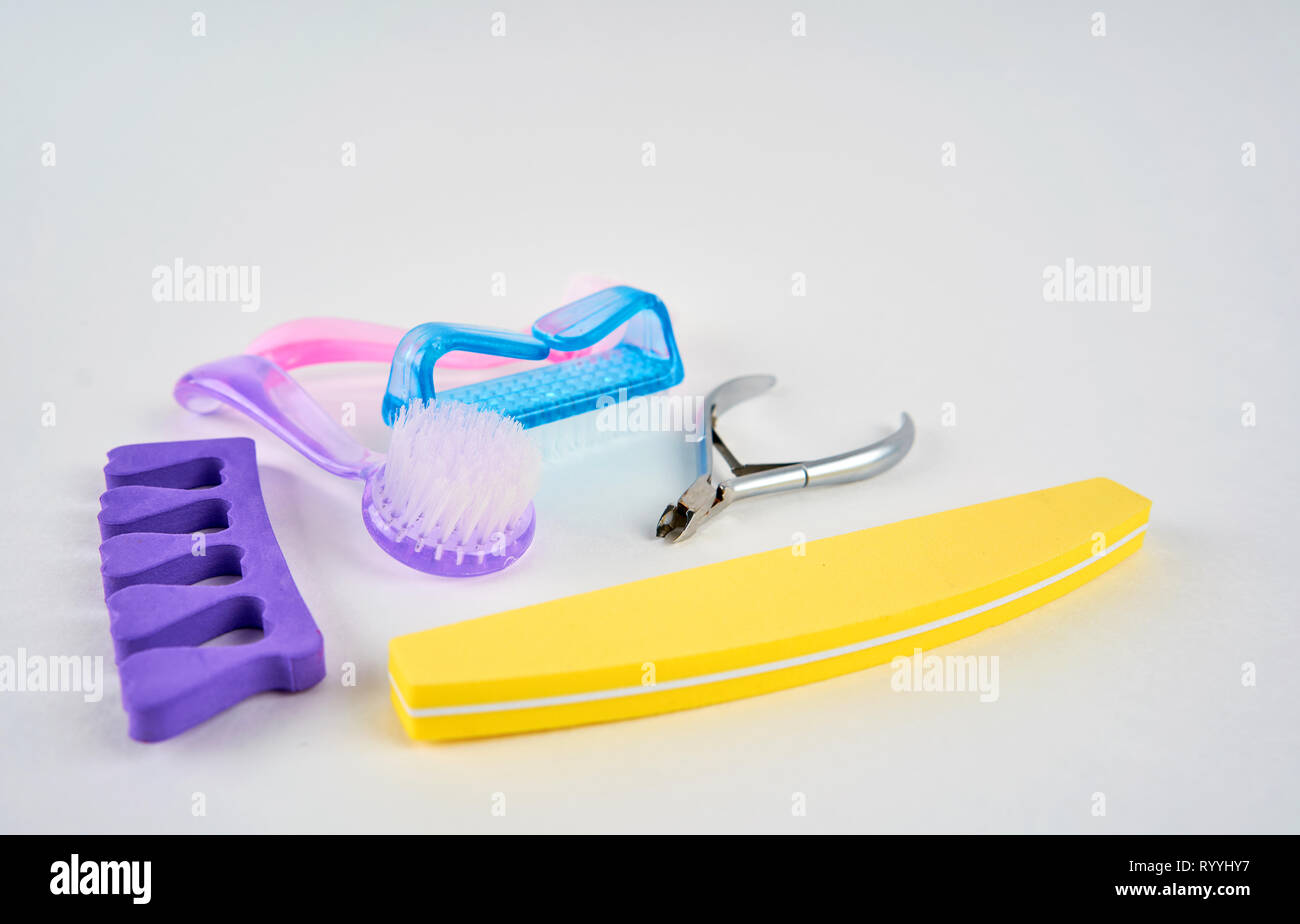 manicure tools on a white background Stock Photo - Alamy