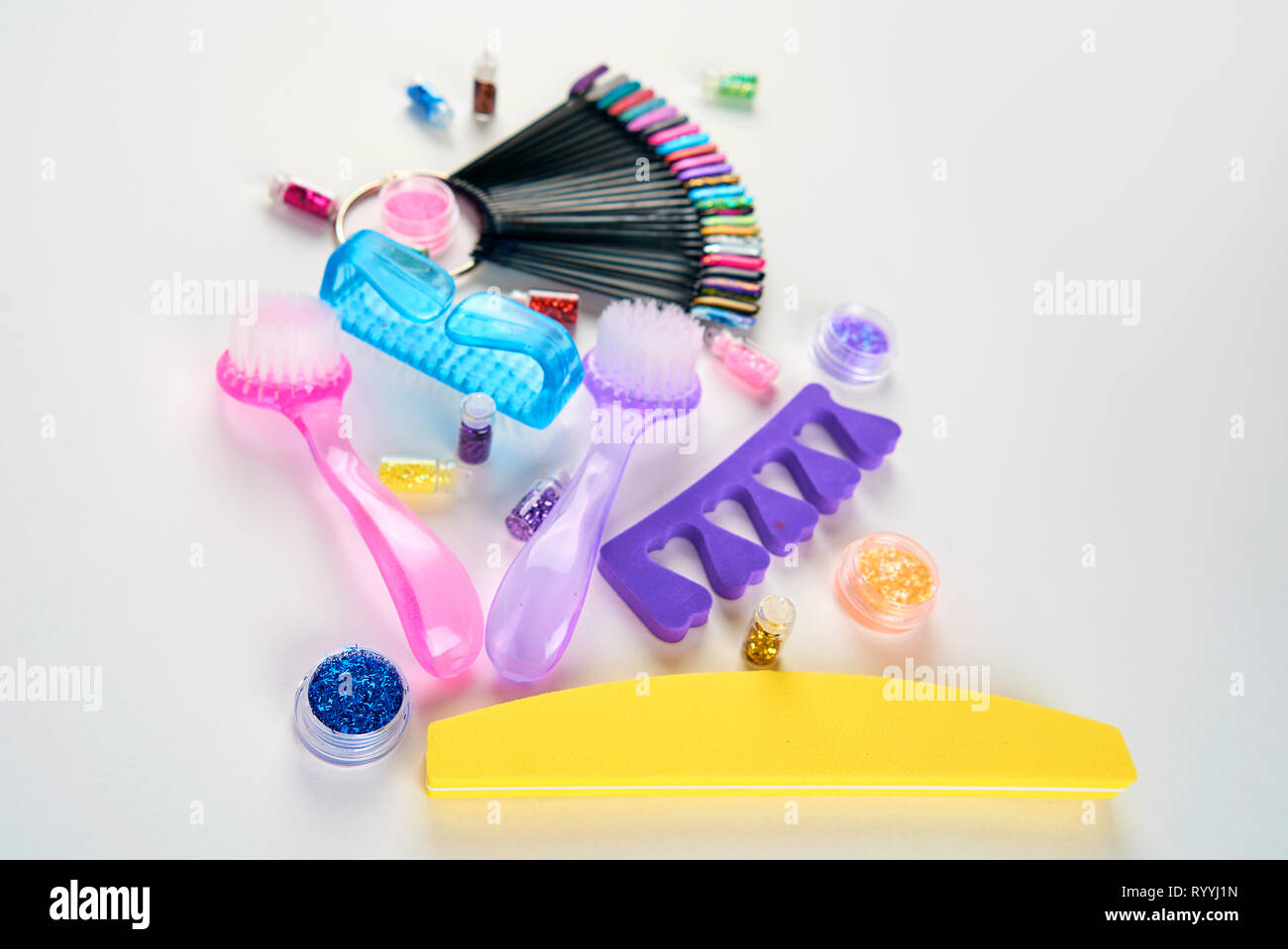 manicure tools on a white background Stock Photo - Alamy