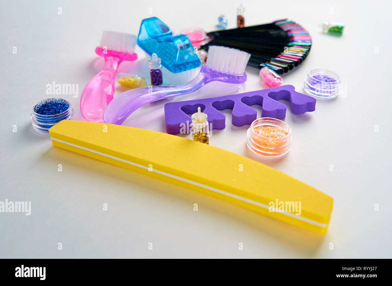 manicure tools on a white background Stock Photo - Alamy