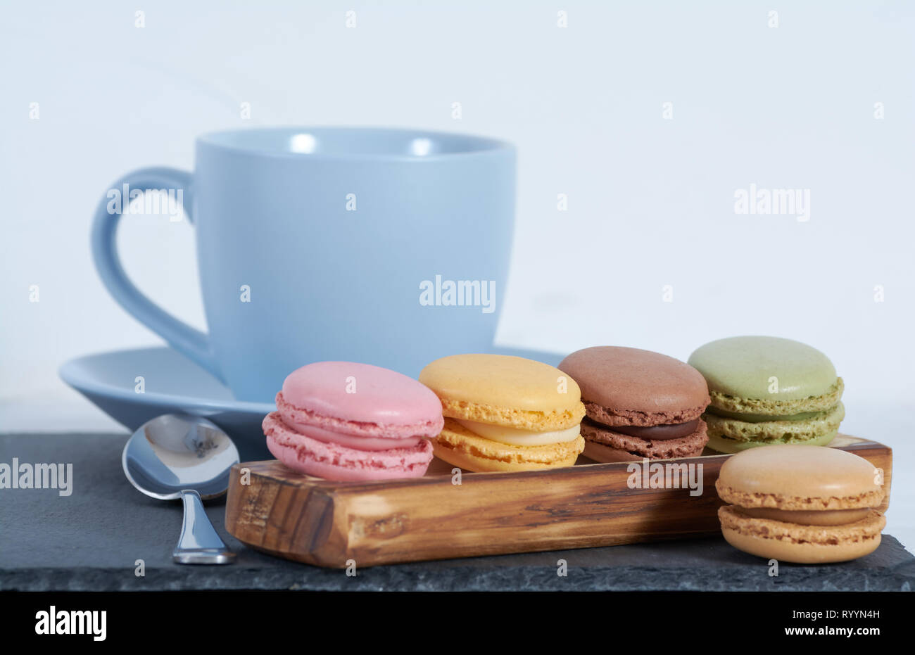 breakfast of macarons wooden splint Stock Photo - Alamy