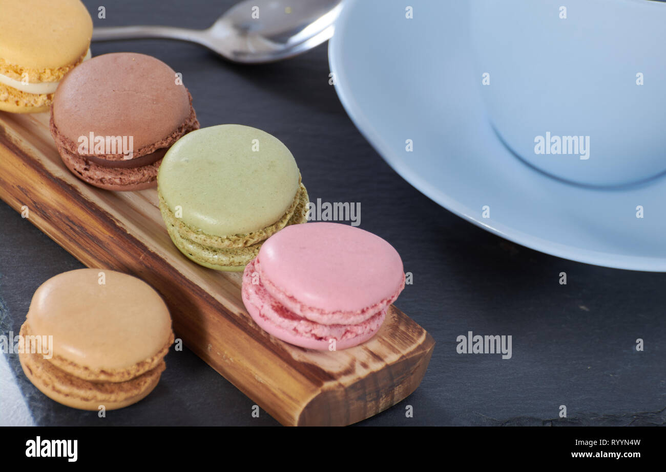 breakfast of macarons wooden splint Stock Photo - Alamy