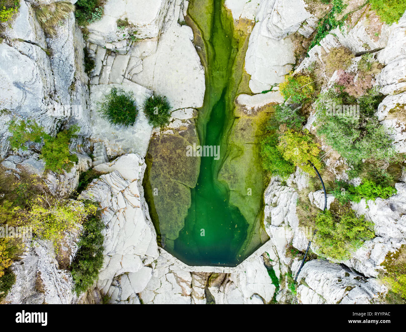Aerial top down view of Papingo Rock Pools, also called ovires, natural ...
