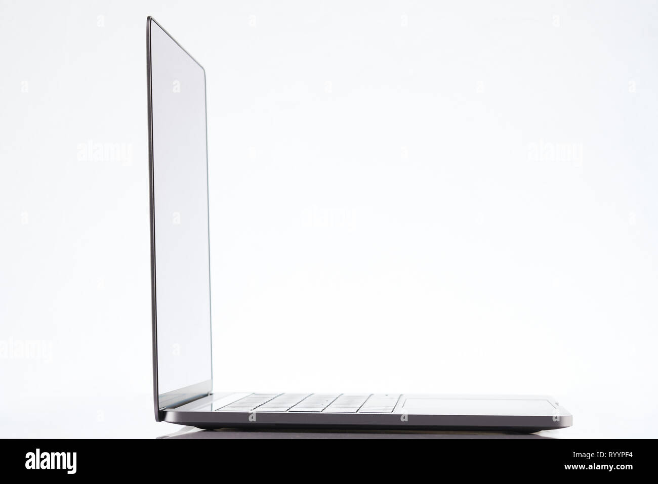 Side view of modern laptop isolated on white background Stock Photo - Alamy