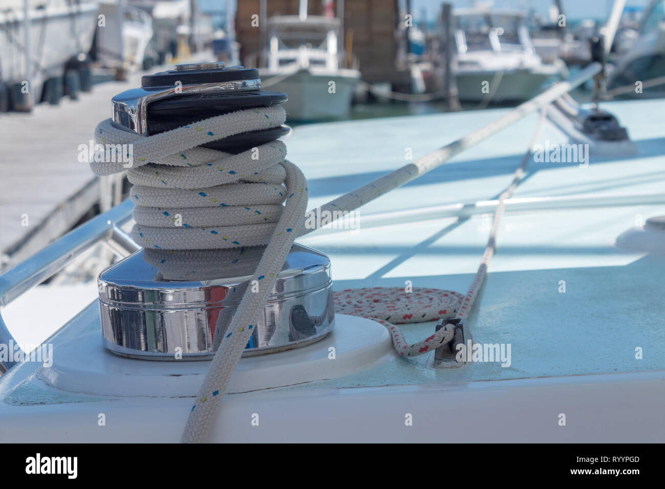closeup on sailing rope. detail shot on coiled rope ready to set sail ...