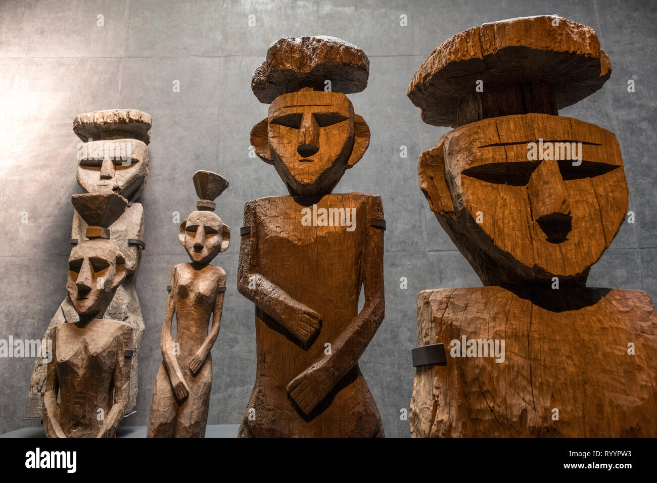A display of Chemamulles, or large wooden Mapuche funerary statues, in ...
