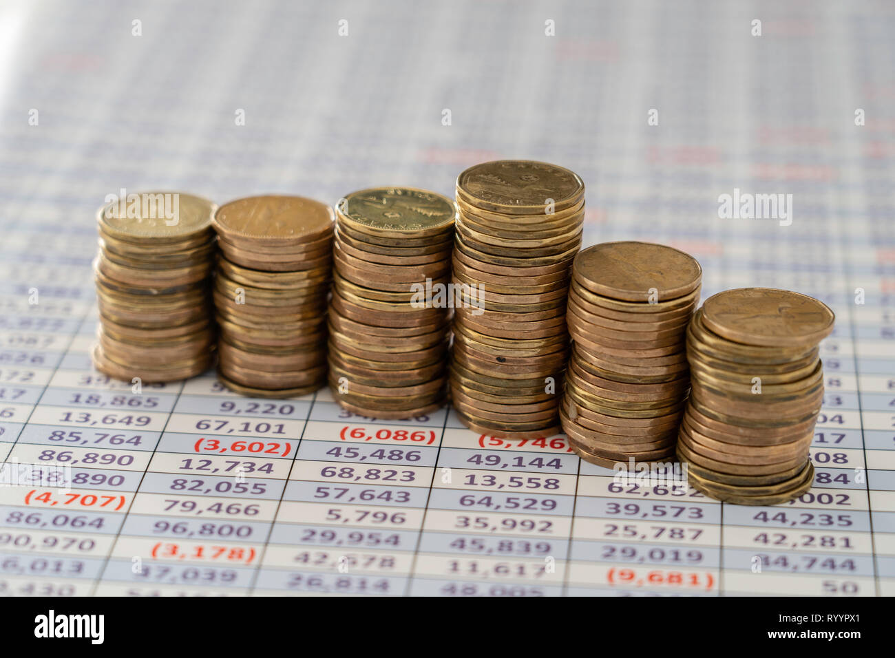Graph rows coins business hi-res stock photography and images - Alamy