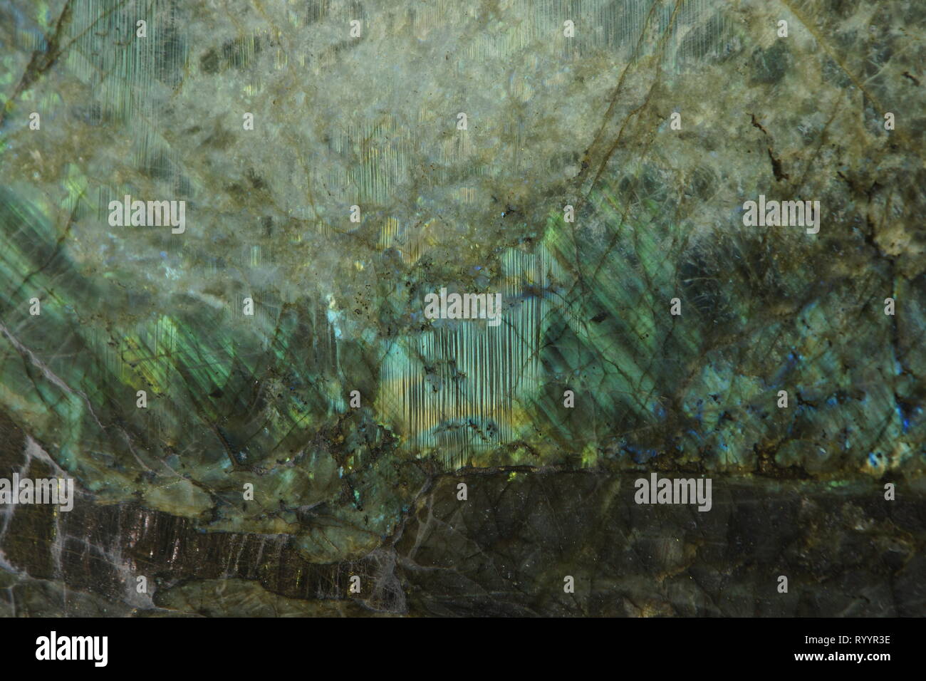 Natural stone with a beautiful shine of green color, called Labradorit ...