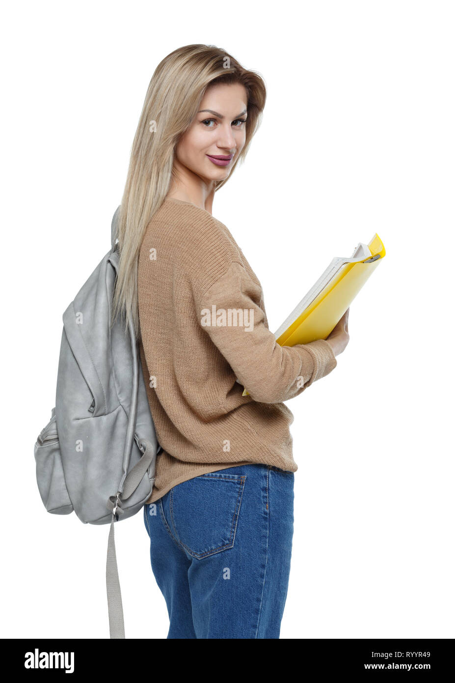 Back view of woman student. girl with the backpack and textbooks. Rear ...