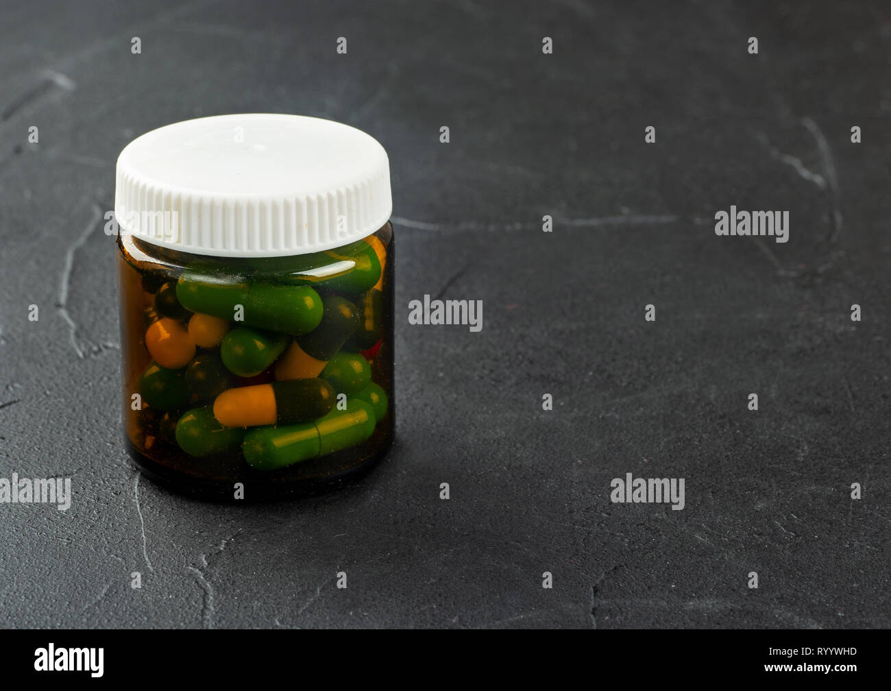Various capsules tablets container hi-res stock photography and images ...